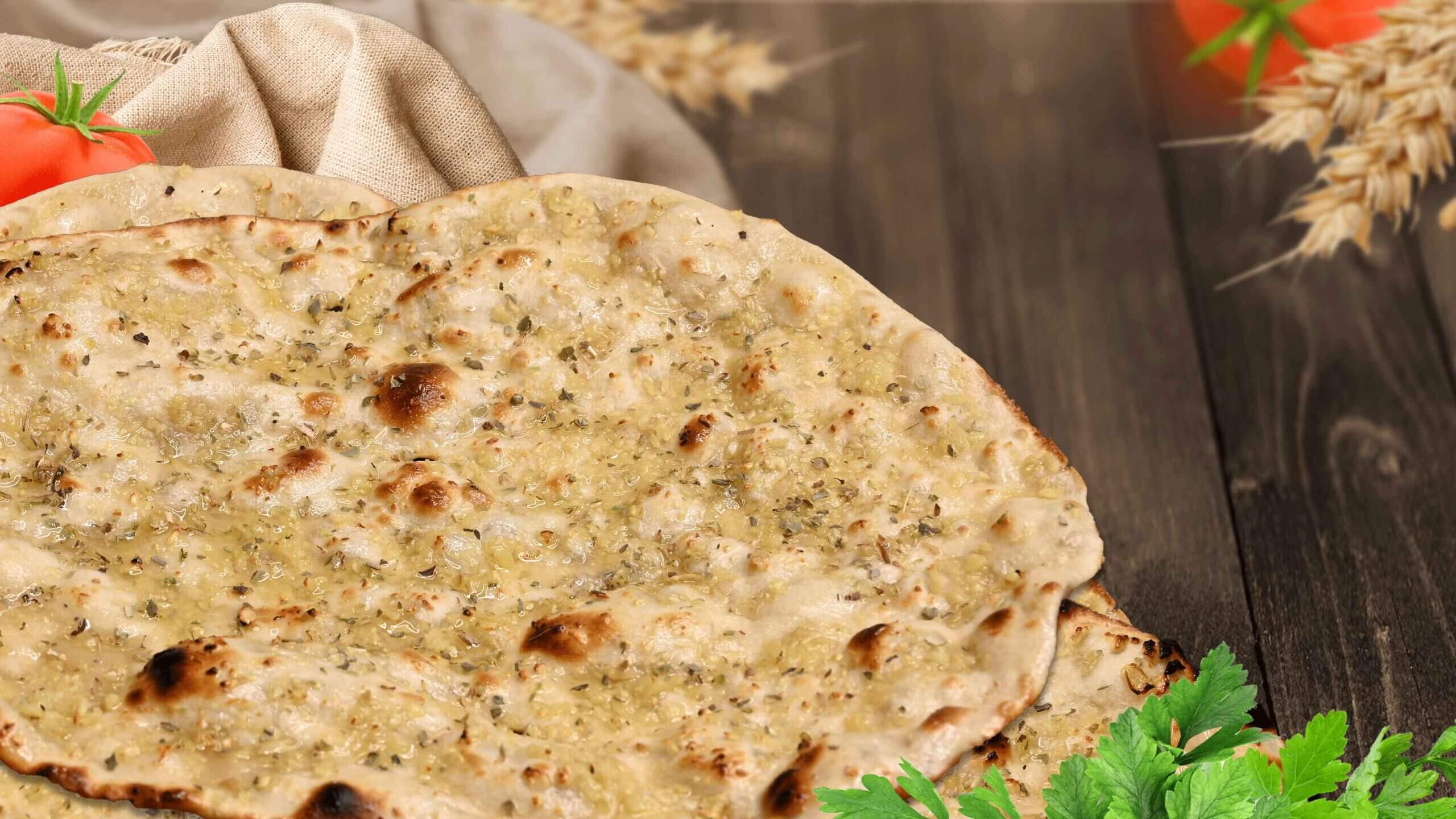 Garlic Naan - Nour Mahal | Best Indian Food Restaurant